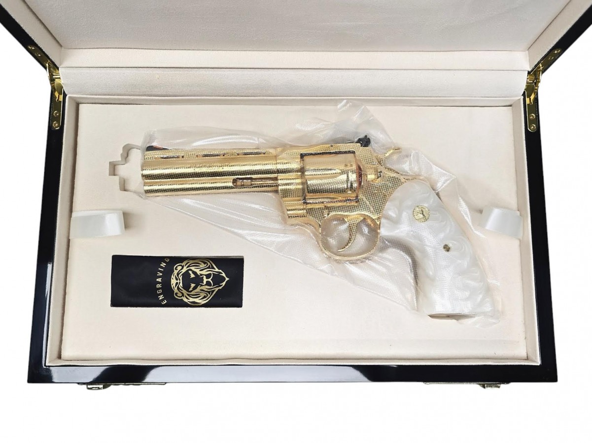 Colt, Limited Edition, Python, 24K Gold, 357 Magnum, with 5" Barrel. Features a 24K Gold Frame ...